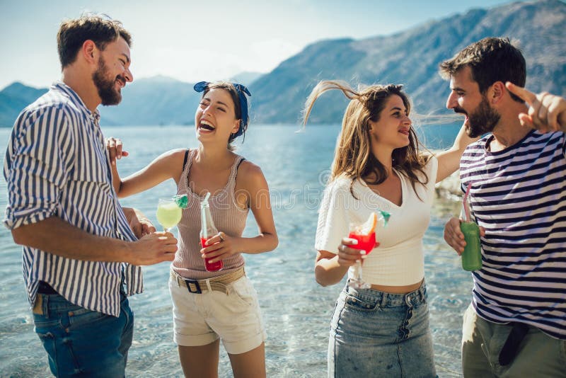 Friends at the Beach Drinking Cocktails Having Fun Stock Photo - Image ...