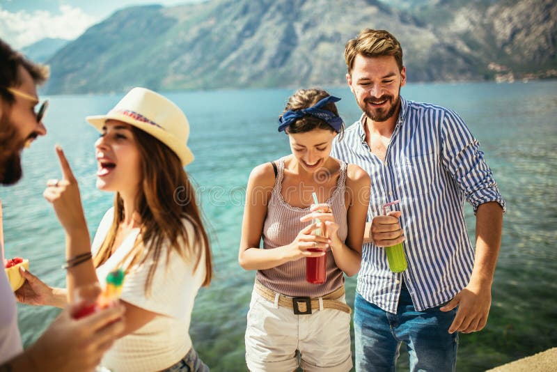Friends at the Beach Drinking Cocktails Having Fun on Summer Vacation ...