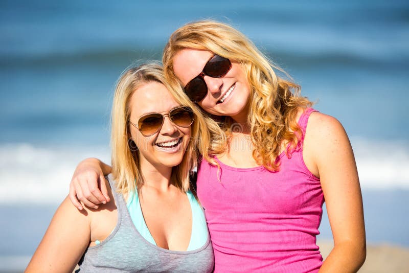 Friends at the beach stock photo. Image of joyful, beach - 51815872