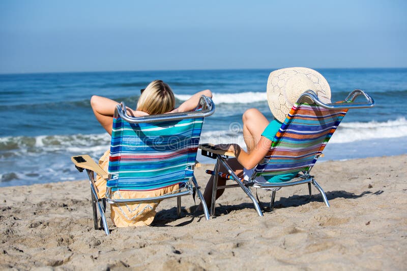 Friends at the beach stock image. Image of beach, lounge - 51815945