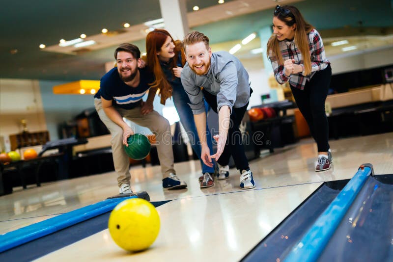 Friends bowling at club stock image. Image of activity - 104109751