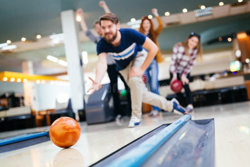 Friends bowling at club stock image. Image of happy, hobbies - 89828191