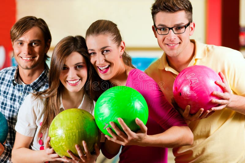 Friends bowling having fun stock image. Image of holding - 19579651
