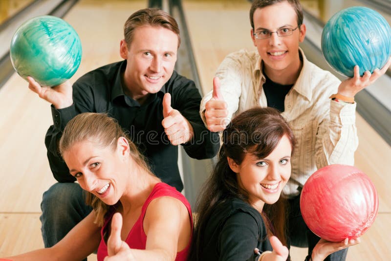 Friends bowling together stock photo. Image of bowling - 12169466