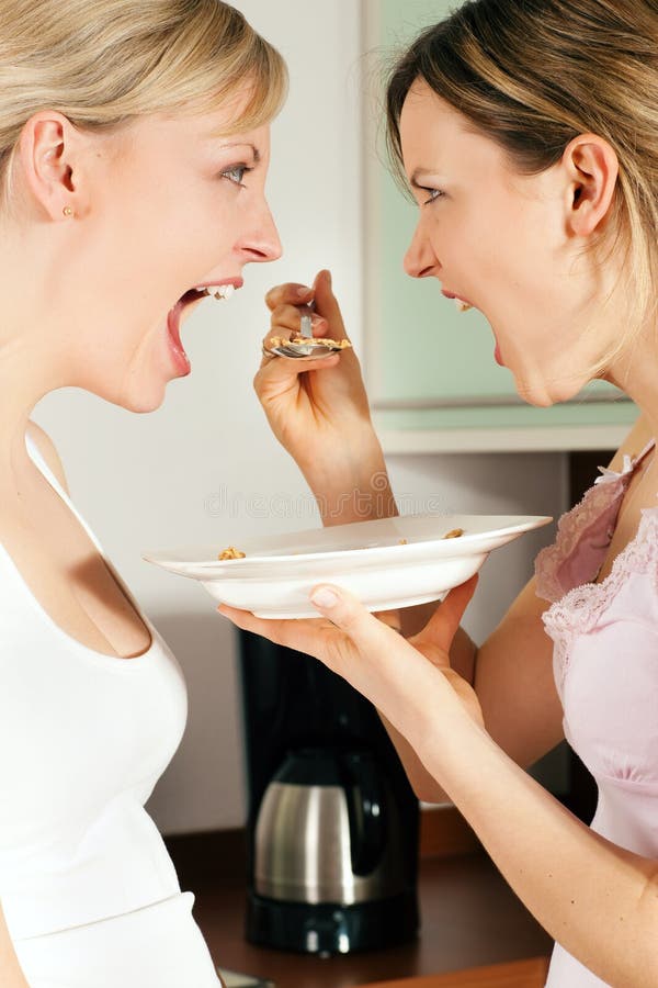 Friends Breakfasting Cereals Stock Photo - Image of happy, women: 12335614