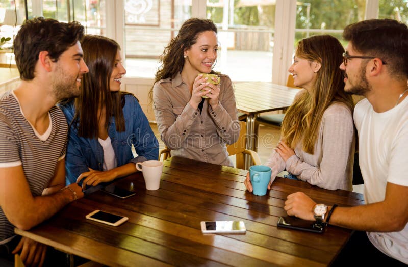 Friends at the cafe stock image. Image of group, couples - 140030819