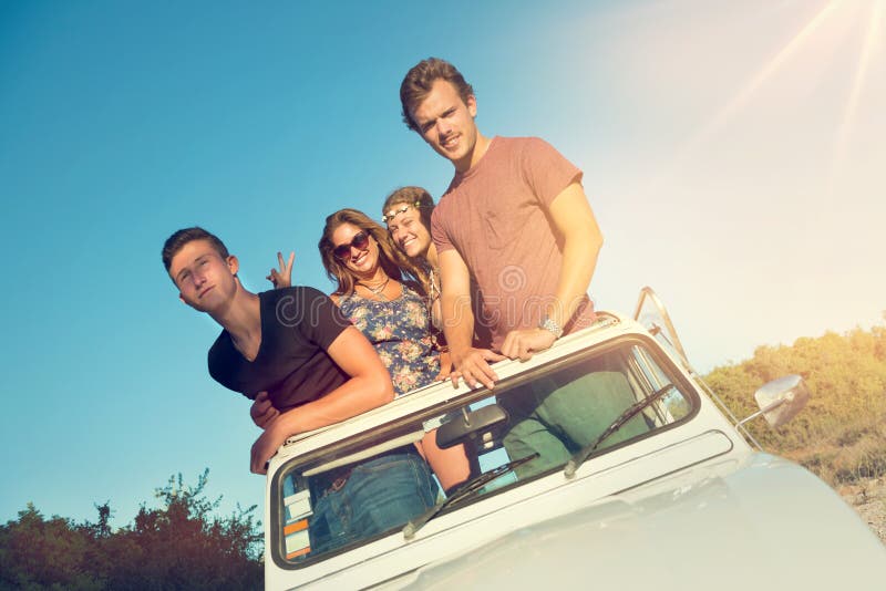 Friends in a car stock image. Image of group, getaway - 127496899