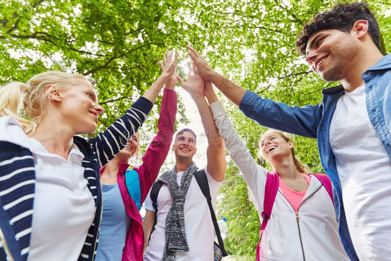 Friends Celebrate Success with High Five Stock Image - Image of ...
