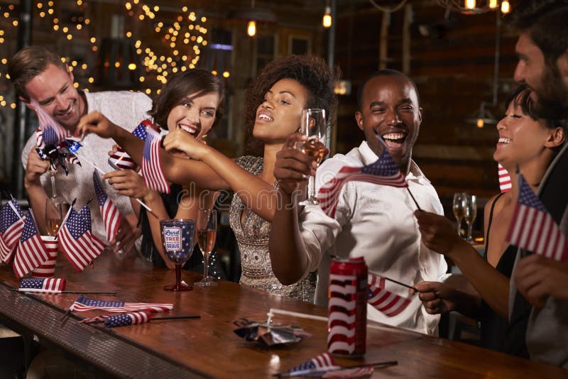 Friends Celebrating July 4th at a Party in a Bar Stock Image - Image of ...