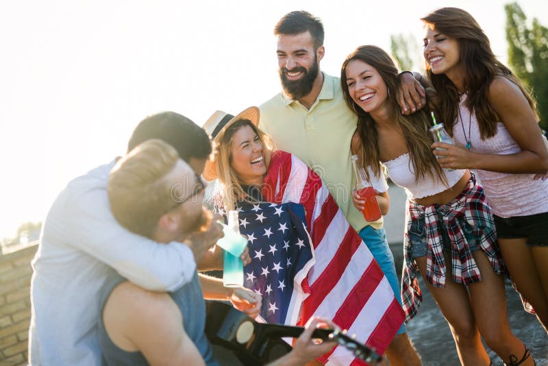 Friends Celebrating 4th of July Holiday Stock Image - Image of music ...