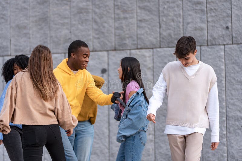 Friends Chatting and Dancing on a Grey Background. Stock Photo - Image ...