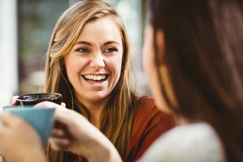 Friends Chatting Over Coffee Stock Photo - Image of holding, beverage ...