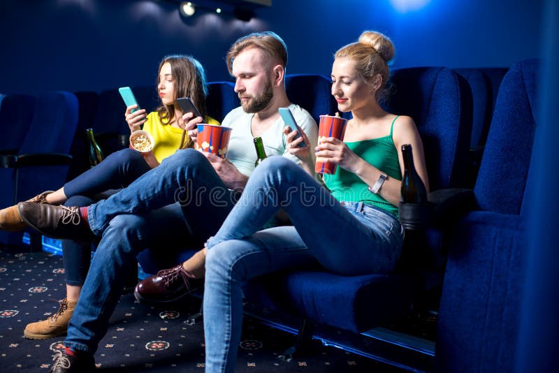 Friends in the cinema stock photo. Image of friendship - 88910292
