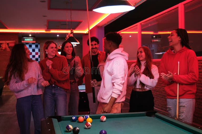 Friends Clapping Hands and Enjoying Billiard Game in Nightclub Stock ...