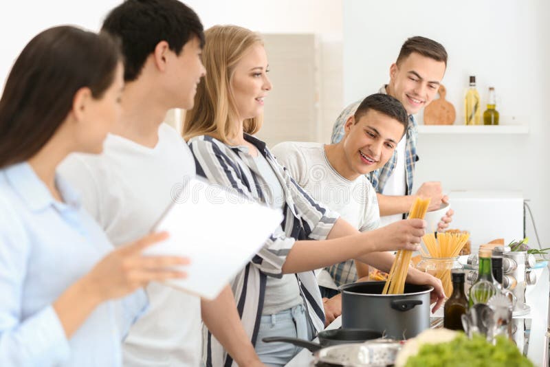 Friends Cooking Together in Kitchen Stock Image - Image of leisure ...
