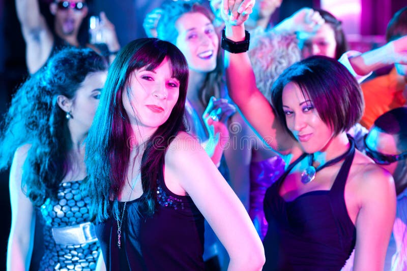 Friends Dancing in Club or Disco Stock Image - Image of attractive ...