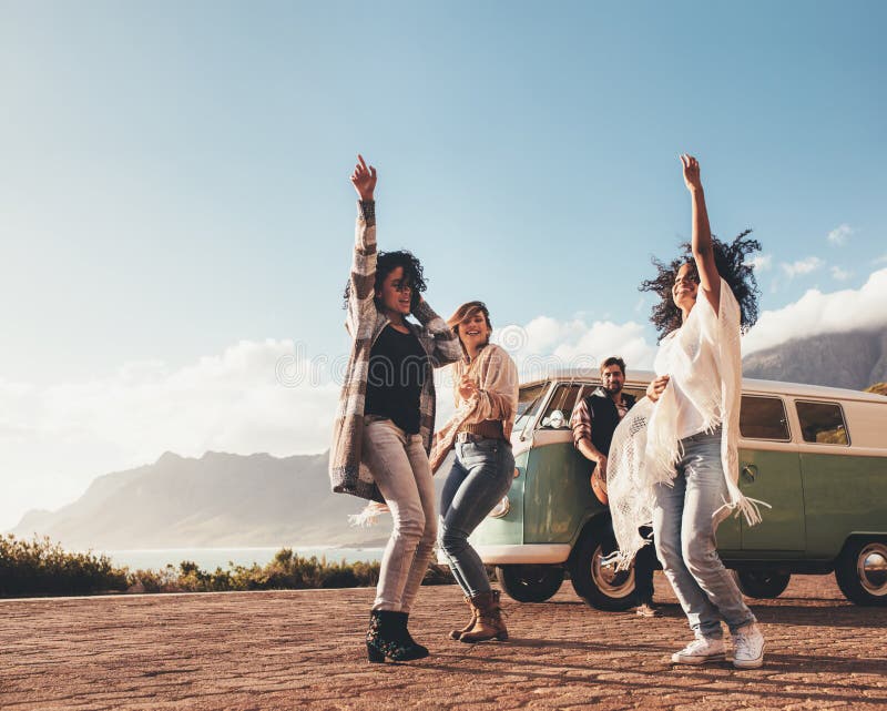 Friends Dancing and Having Fun on Road Trip Stock Image - Image of ...
