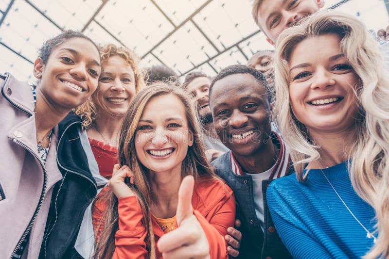 Friends of Different Ethnicities Looking into the Camera Stock Image ...