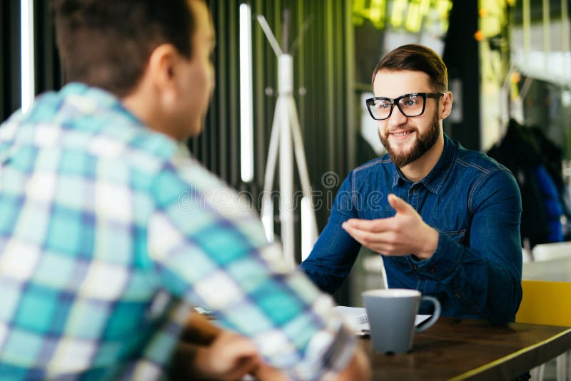 Friends Discuss Drinking Coffee in a Coffee Shop Stock Image - Image of ...