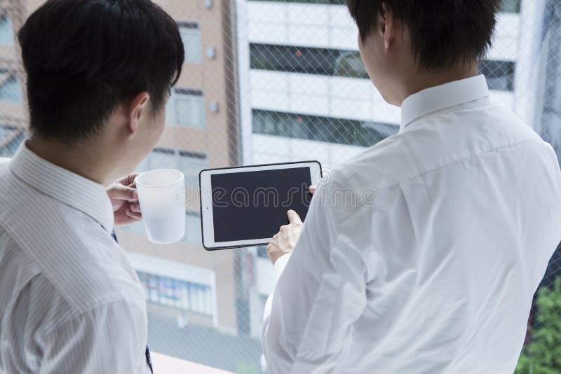 Friends Discuss Two Men during a Work Break Stock Photo - Image of ...