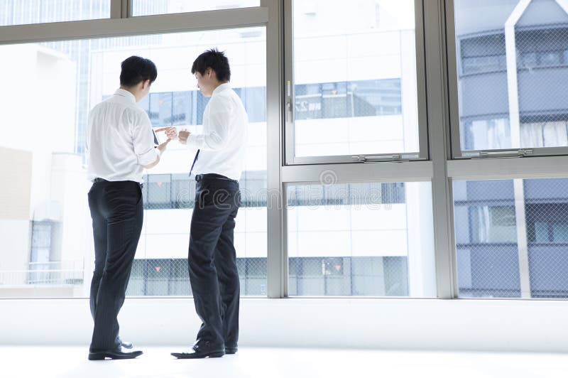 Friends Discuss Two Men during a Work Break Stock Photo - Image of ...