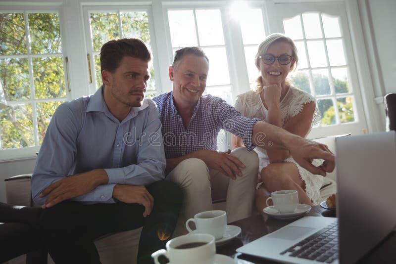 Friends Discussing Over Laptop in Farm Stock Image - Image of activity ...