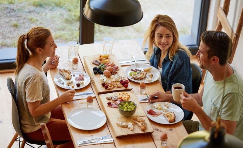 Happy Friend Eating Together Stock Photo - Image of happy, food: 158426682