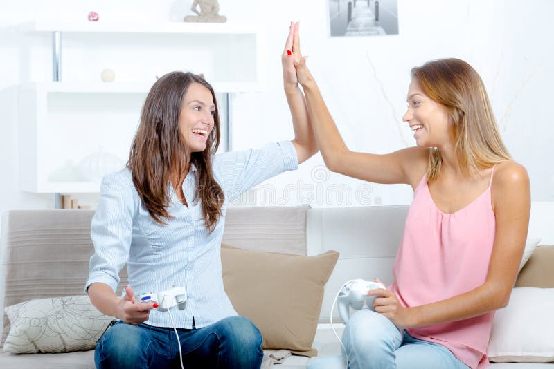 Friends Doing High Five after Computer Game Stock Image - Image of ...