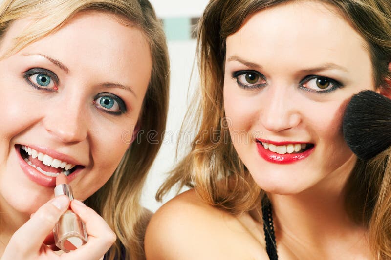 Friends doing make-up stock photo. Image of adult, complexion - 12358004