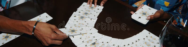 Friends doing tarot spread stock image. Image of insight - 317839941