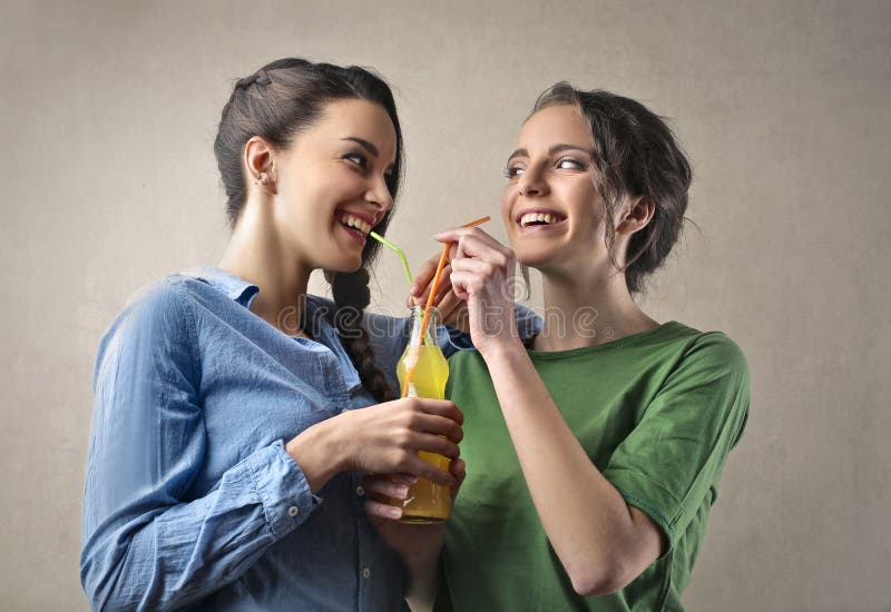 Friends drinking stock photo. Image of hairstyle, beauty - 71277938