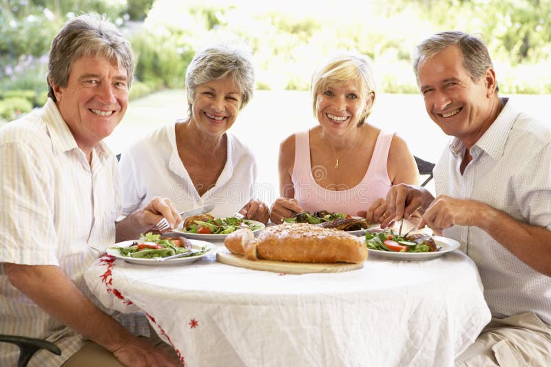 Friends Eating an Al Fresco Lunch Stock Image - Image of salad, garden ...