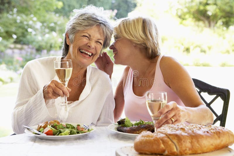 Friends Eating an Al Fresco Meal Stock Photo - Image of middle, meal ...