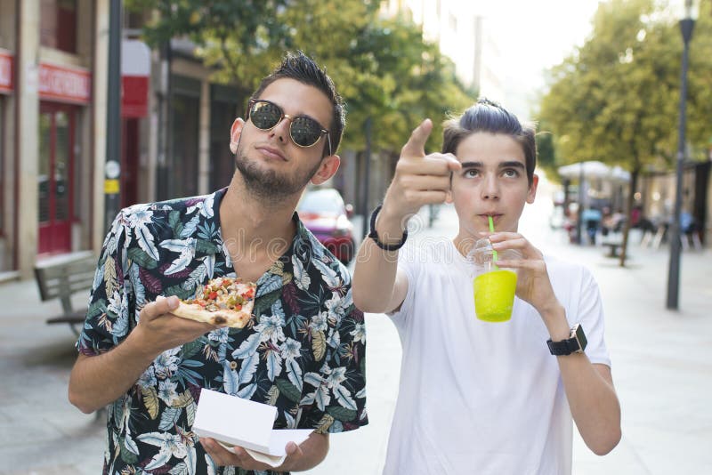 Friends eating in the city stock photo. Image of nutrition - 137845816