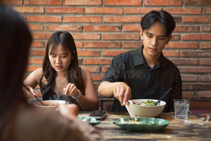Friends Eating Together in Restaurant Stock Image - Image of lunch ...