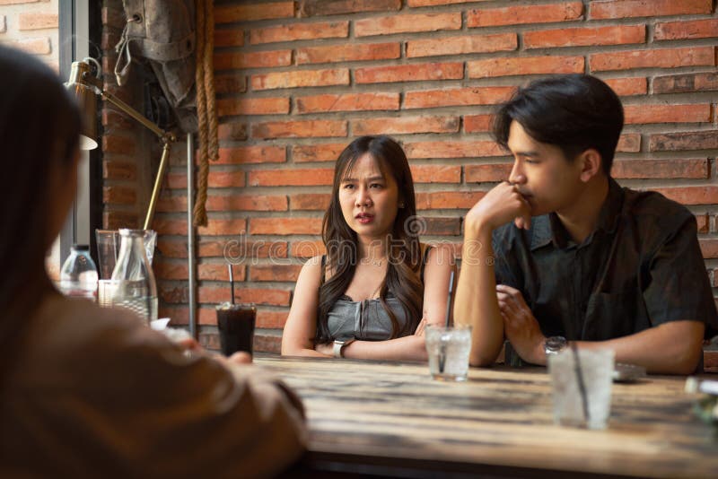 Friends Eating Together in Restaurant and Having Argument Stock Photo ...