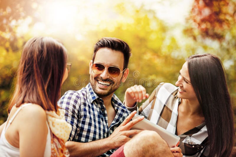 Friends Ejnoying Outside stock image. Image of outgoing - 76098137
