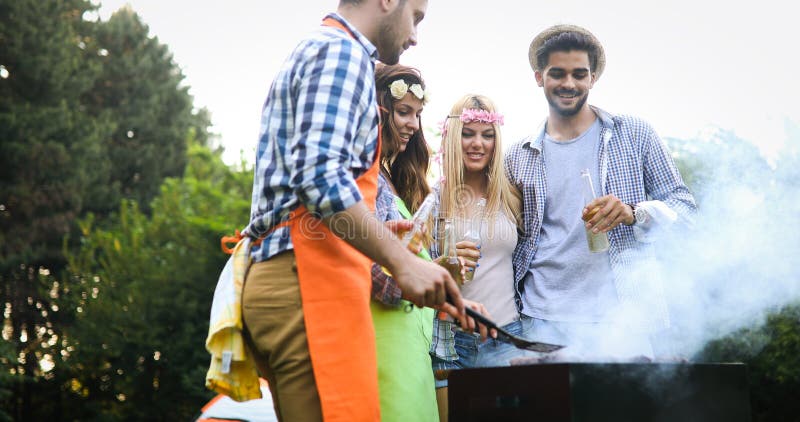 Friends enjoying bbq party stock photo. Image of background - 123201864