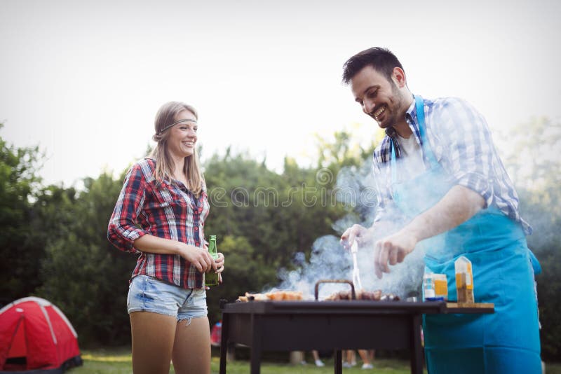 Friends enjoying bbq party stock photo. Image of background - 89812532