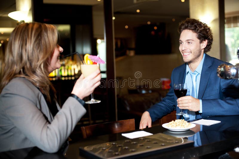 Friends Enjoying Cocktail at the Bar Stock Image - Image of food ...