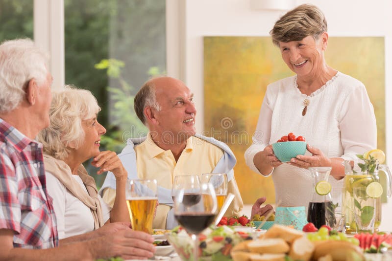 Friends Enjoying an Evening Meal Stock Image - Image of marriage ...
