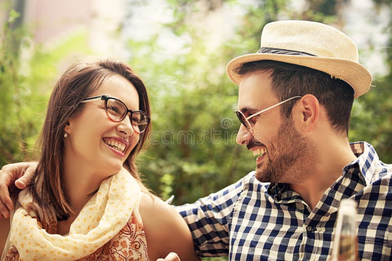Friends enjoying outside stock photo. Image of adults - 78034556