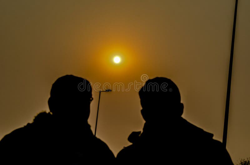 Friends and the Evening Sun Stock Photo - Image of sitting, friends ...
