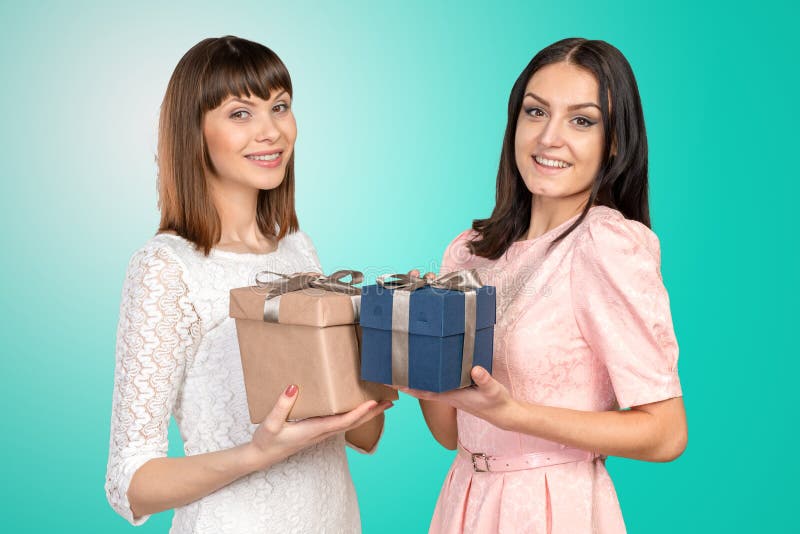 Friends exchanging gifts stock image. Image of friendship - 69888091