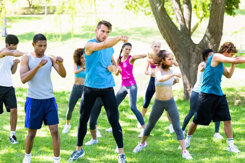 Friends exercising in park stock photo. Image of adult - 39214346