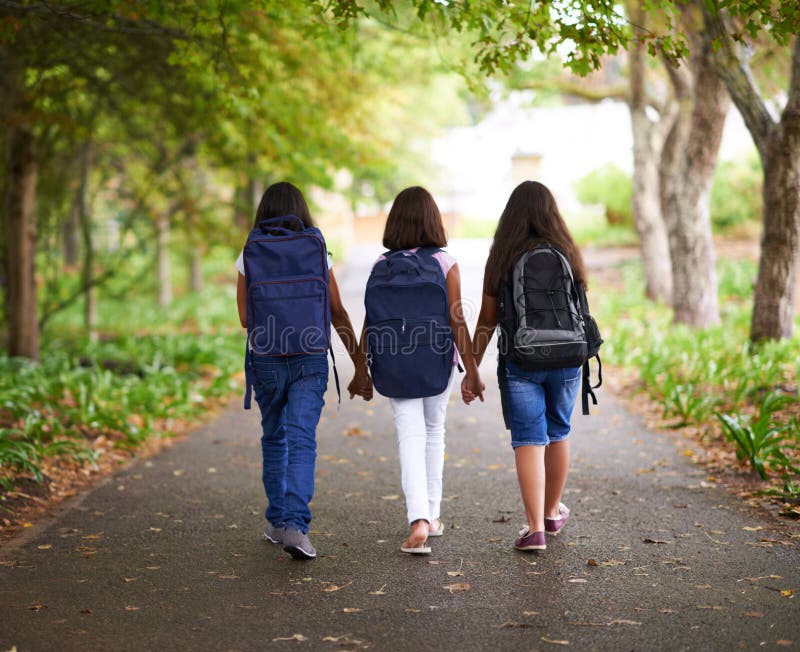 Friends Forever. Three Young Female Classmates Walking Outside. Stock ...