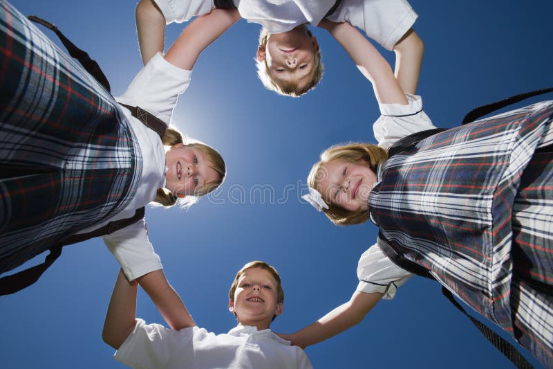 Children Forming Huddle Against Sky Stock Image - Image of leisure ...