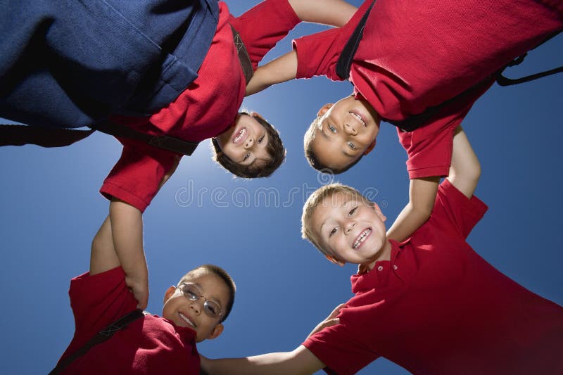 Friends Forming a Huddle stock photo. Image of glee, cute - 29662532