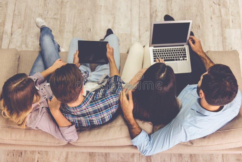 Friends with gadgets stock photo. Image of casual, lifestyle - 82313546