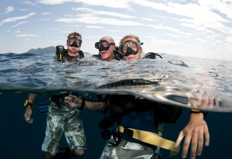 Friends go scuba diving stock photo. Image of fins, sport - 19582634